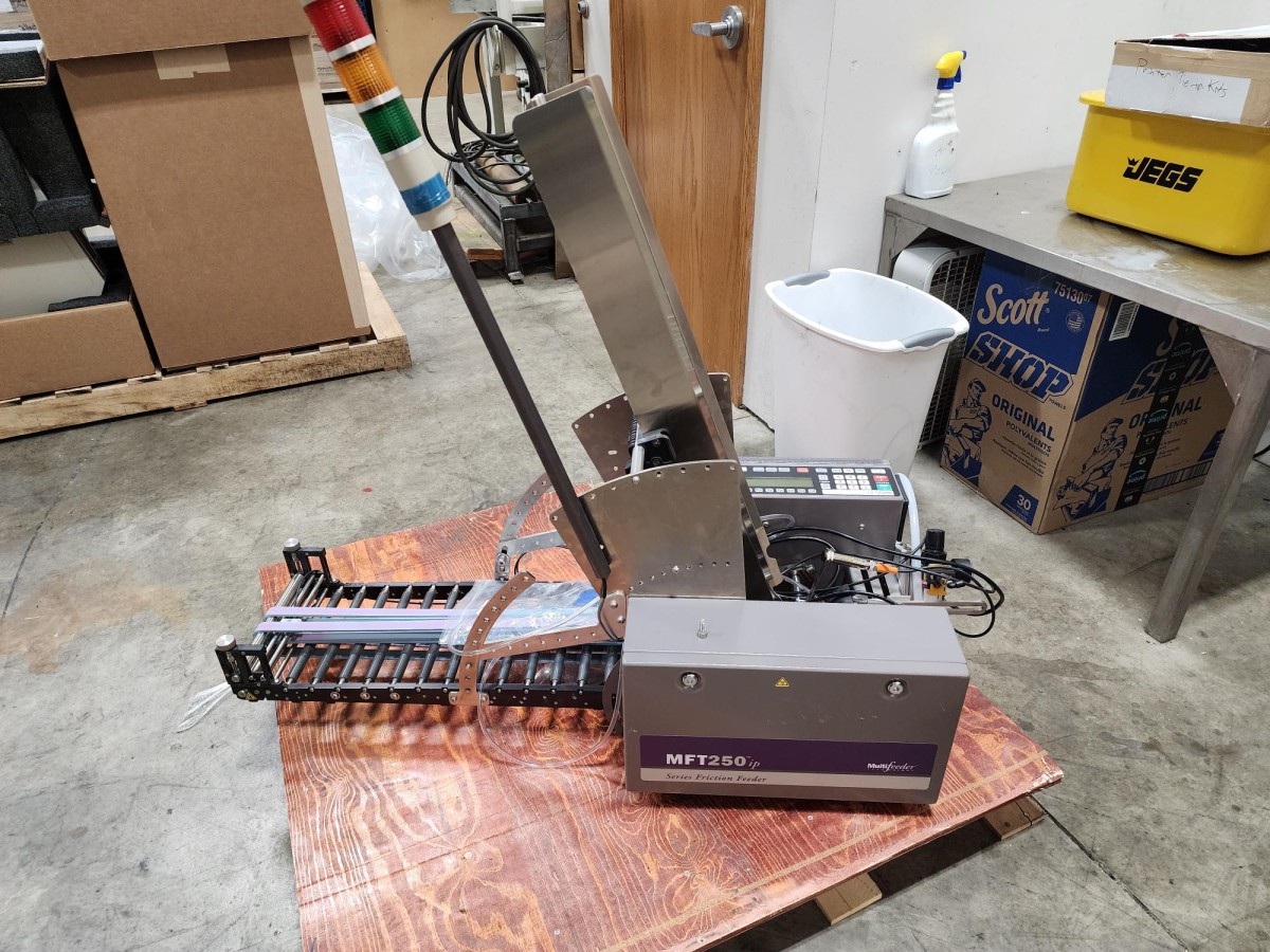 Multi Feeder Friction Feeder and Automatic Product Loader - Managed ...